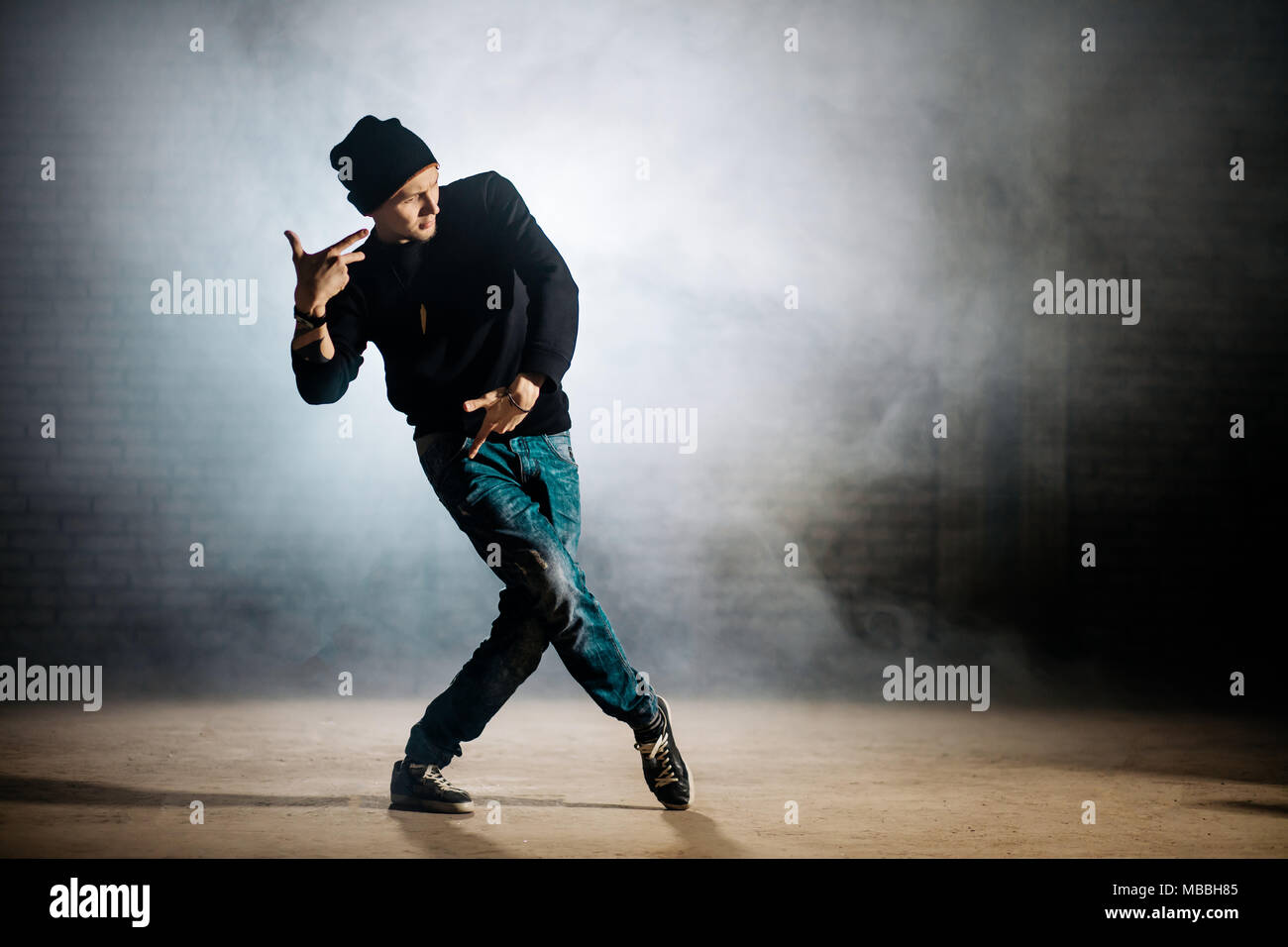 young rapper dancing on the street. hip hop culture Stock Photo - Alamy