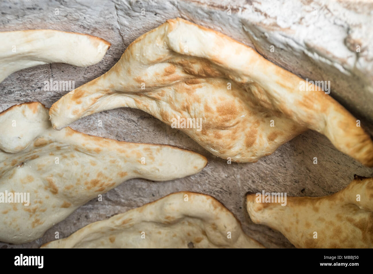 Georgian traditional brick oven. Traditional georgian breads. Cooking ...