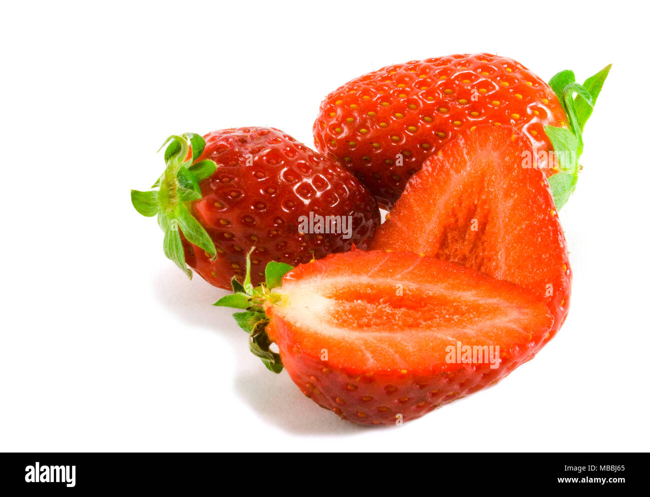 strawberries two whole and one cat Stock Photo - Alamy