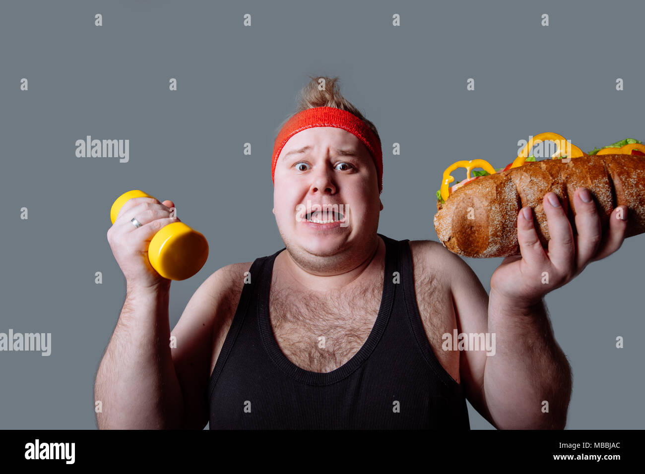 fat man, fight against obesity concept Stock Photo - Alamy