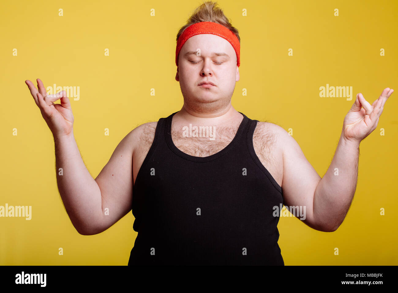 Fat man meditation hi-res stock photography and images - Alamy