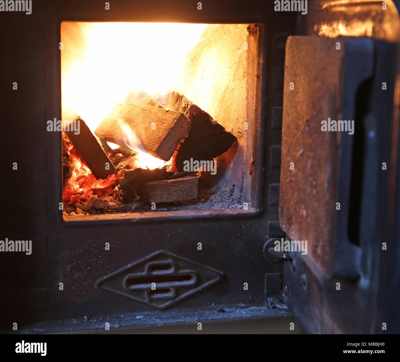 fire and flames in the cast iron boiler Stock Photo - Alamy