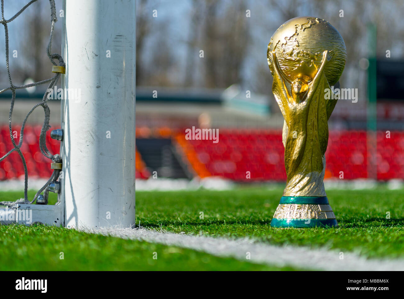 April 9, 2018 Moscow, Russia Trophy of the FIFA World Cup on the green ...