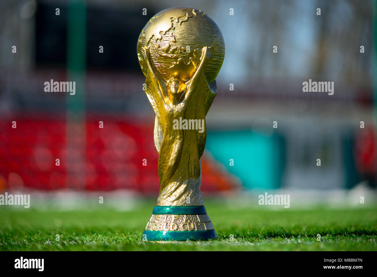 April 9, 2018 Moscow, Russia Trophy of the FIFA World Cup on the green ...