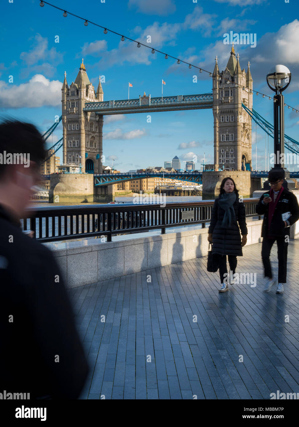 Southern riverside of river Thames by Tower Bridge, Queens Walk, London ...