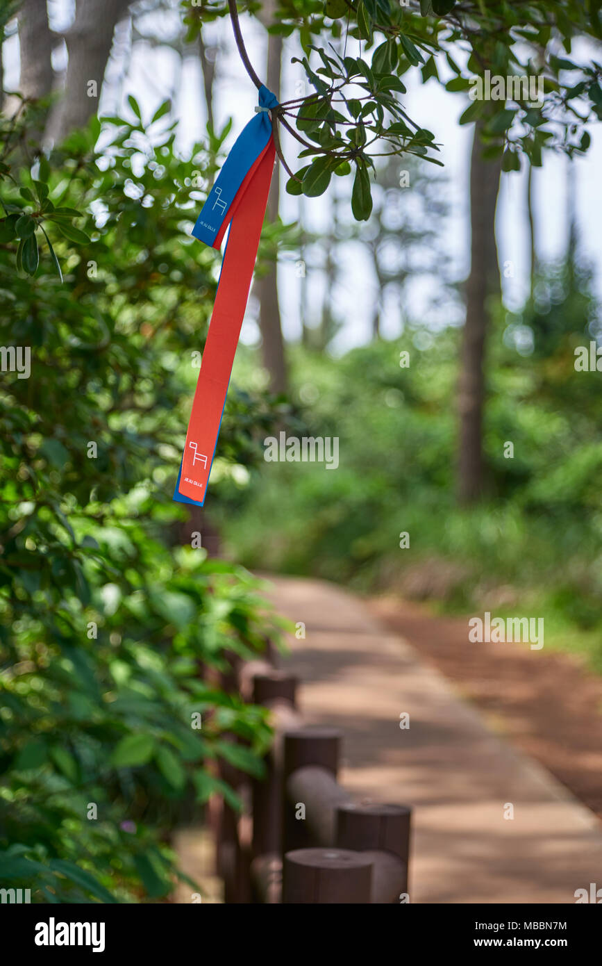 Jeju, Korea - May 25, 2017: Jeju Olle trail marker. Olle trail is a ...