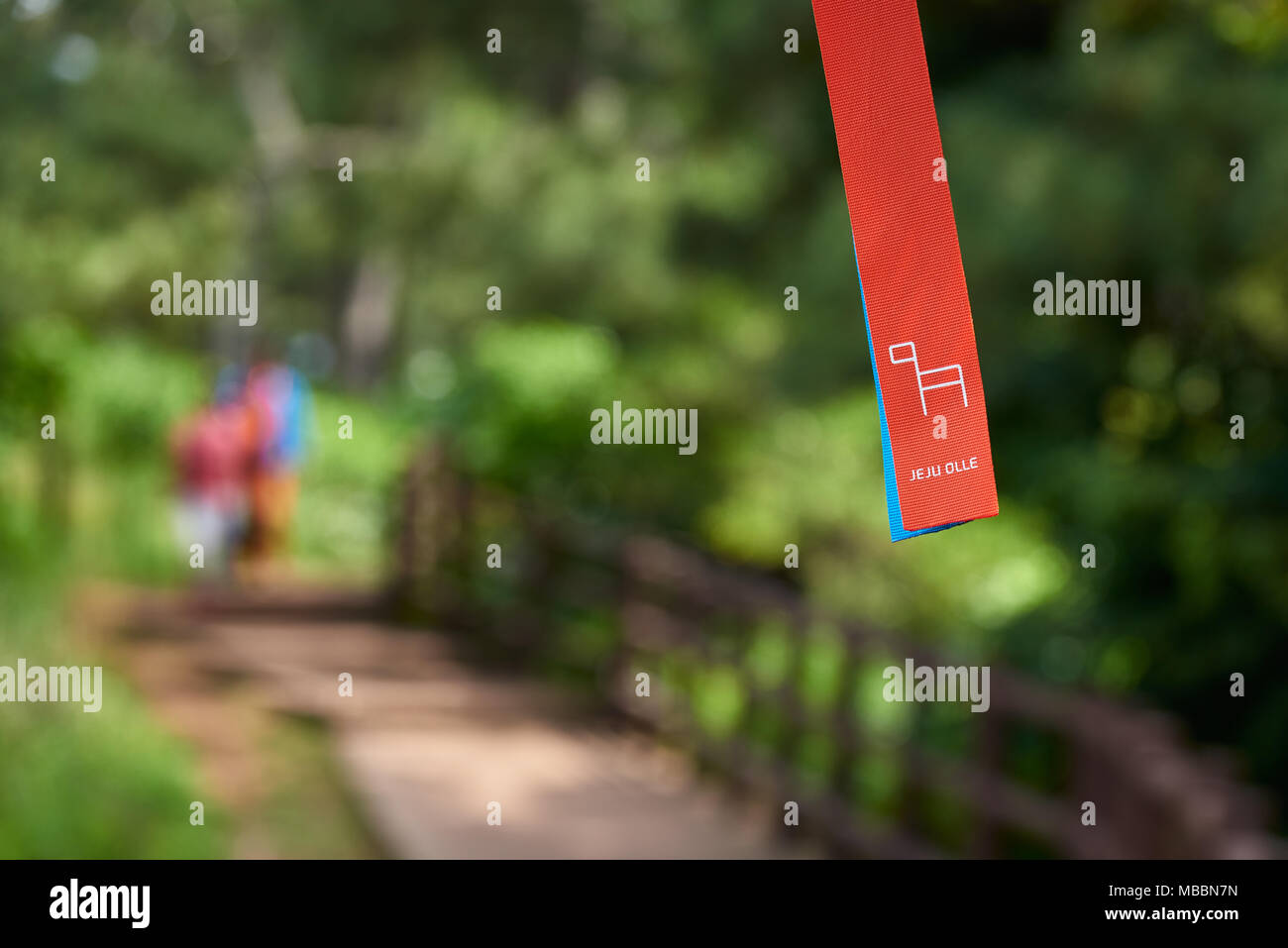 Jeju, Korea - May 25, 2017: Jeju Olle trail marker. Olle trail is a ...