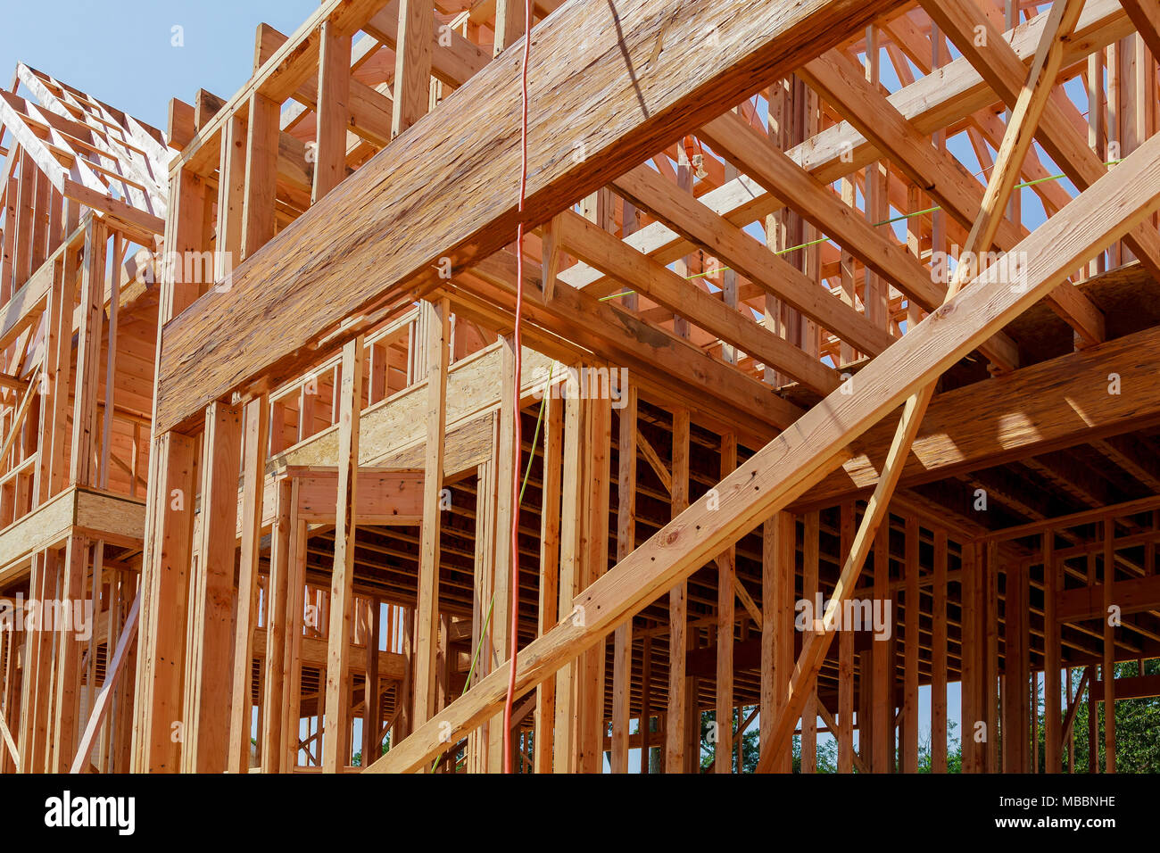 New residential construction home framing with roof view construction ...