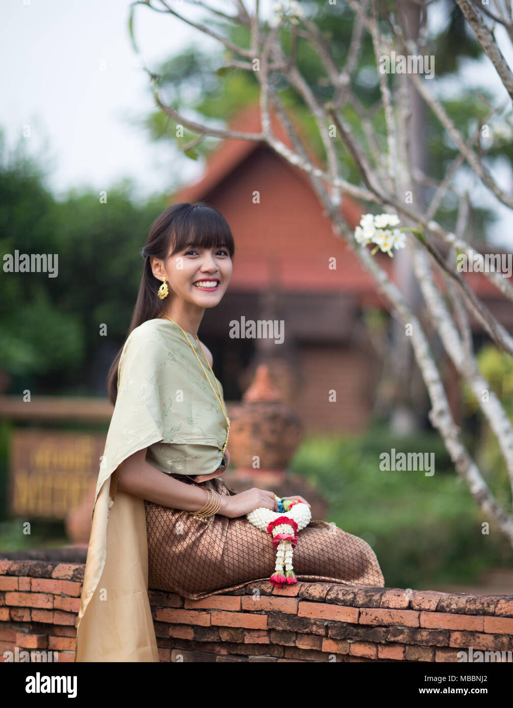 Beautiful young Thai girl with Thai ancient style dressing Stock Photo ...