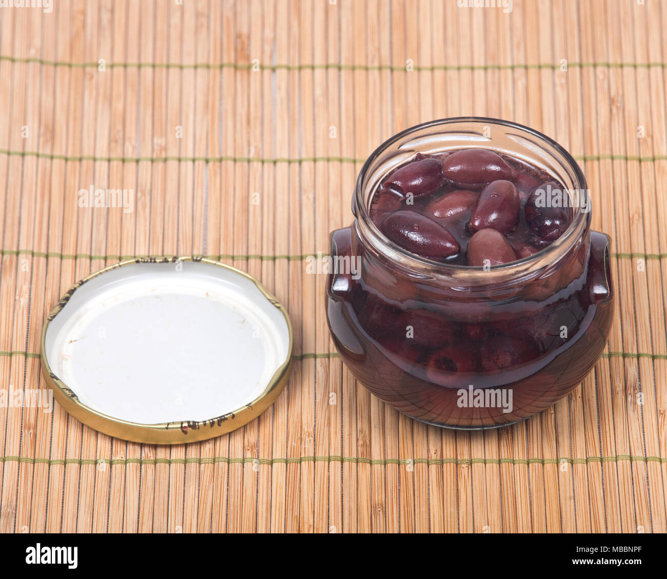 Jumbo pitted kalamata olives in jar Stock Photo - Alamy