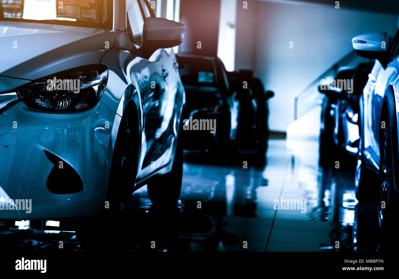 New luxury compact car parked in modern showroom for sale. Car ...