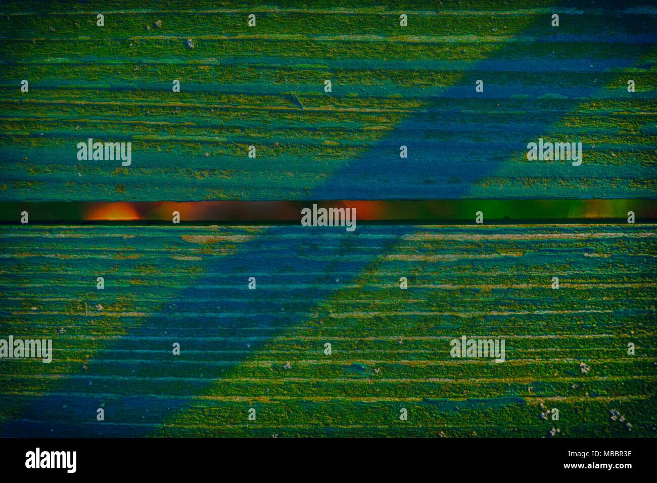 Shaded Spruce colored Texture of old, shabby, green paint on an old ...