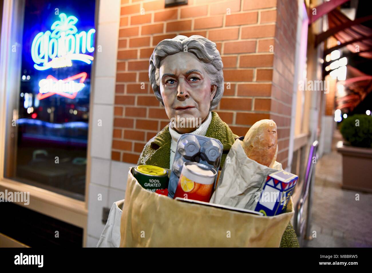 The bag lady carrying groceries statue at the National harbor in ...