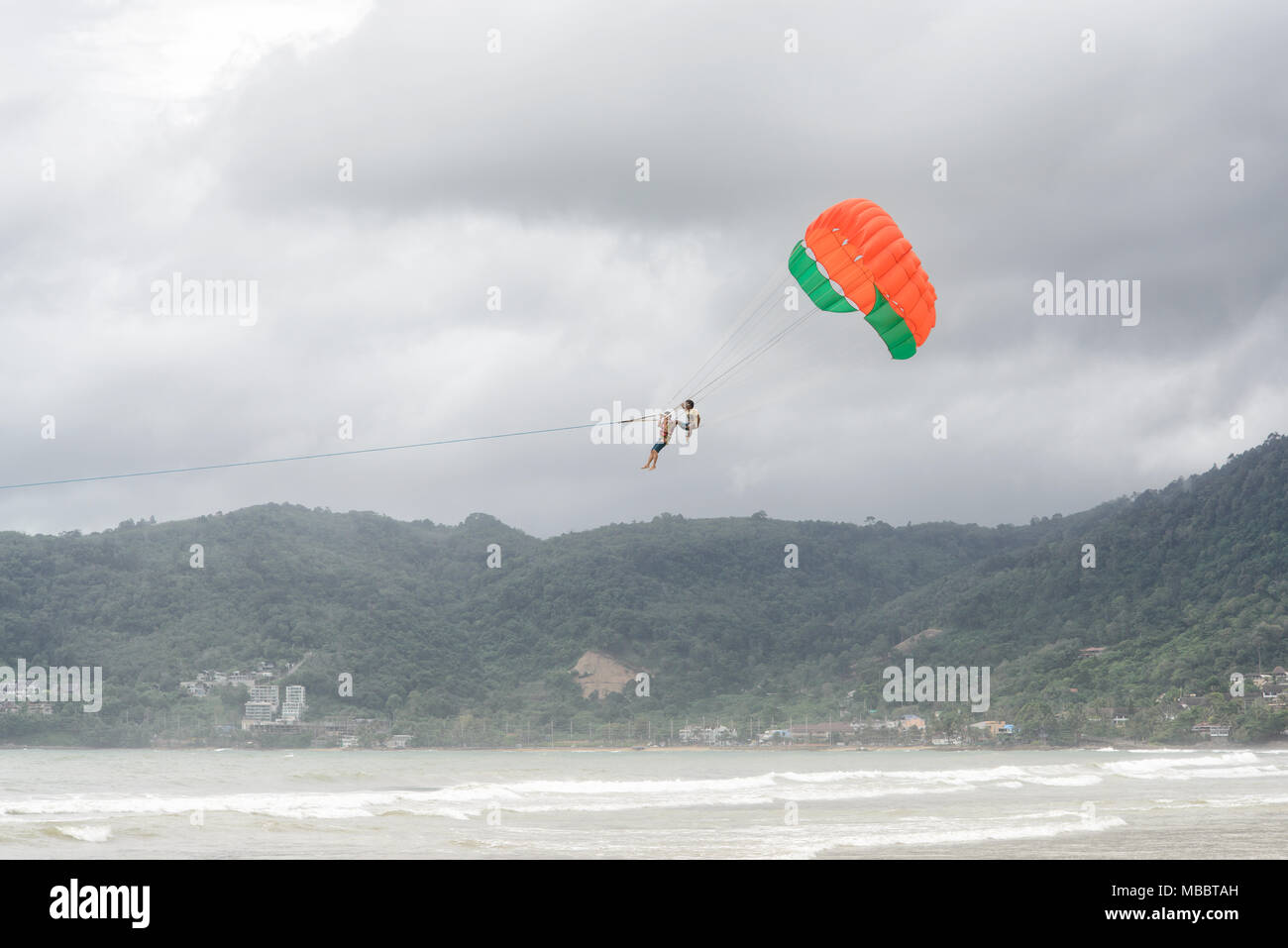 PHUKET, THAILAND - AUGUST 01, 2013: parasailing without license and ...