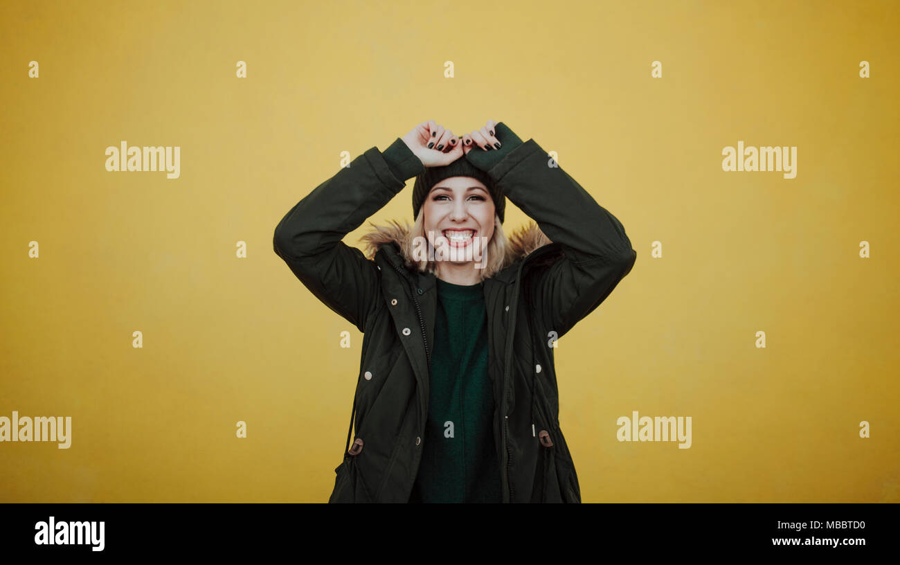 Woman raising arms winter hi-res stock photography and images - Alamy