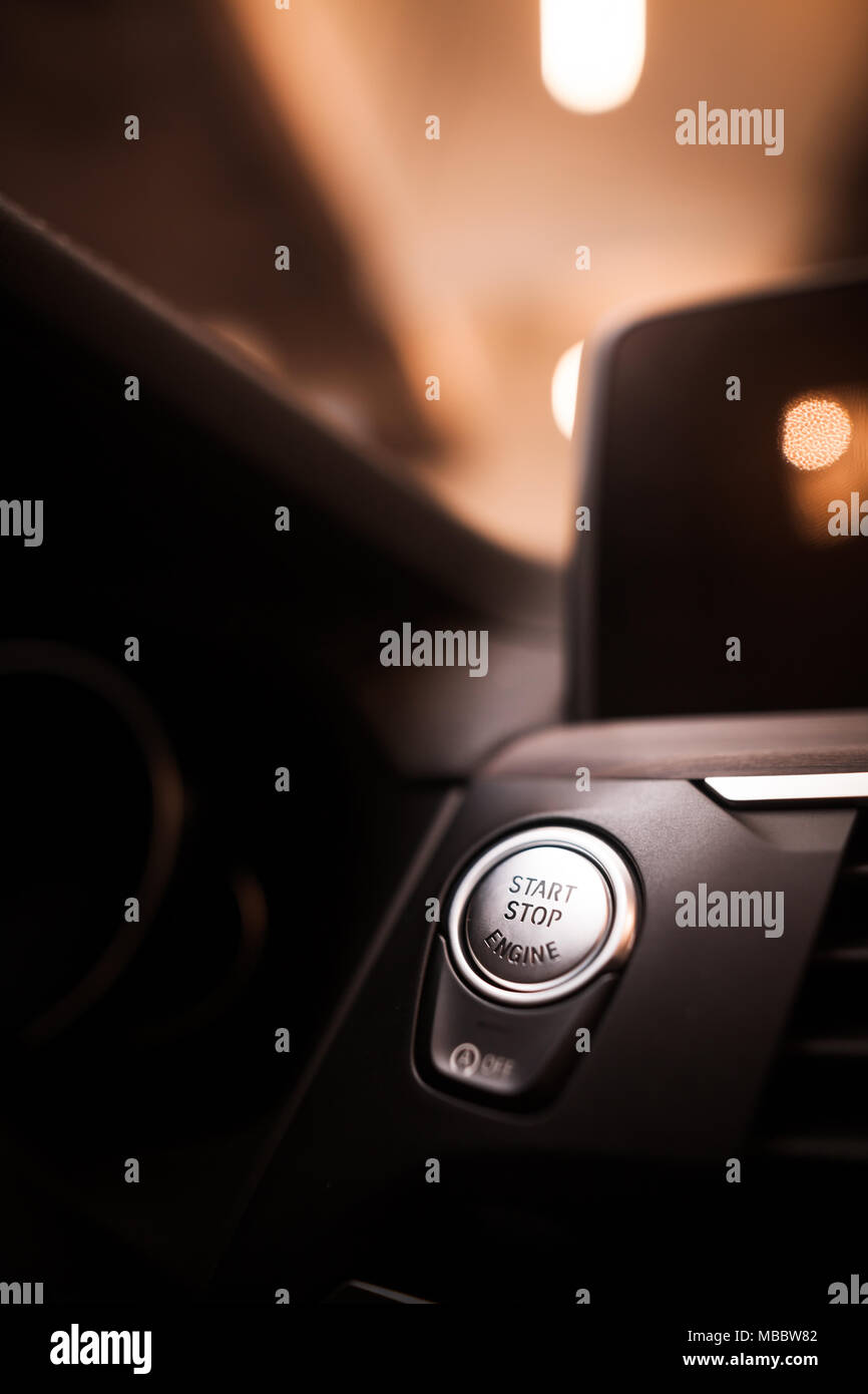 Close up shot of a car start/stop button Stock Photo - Alamy