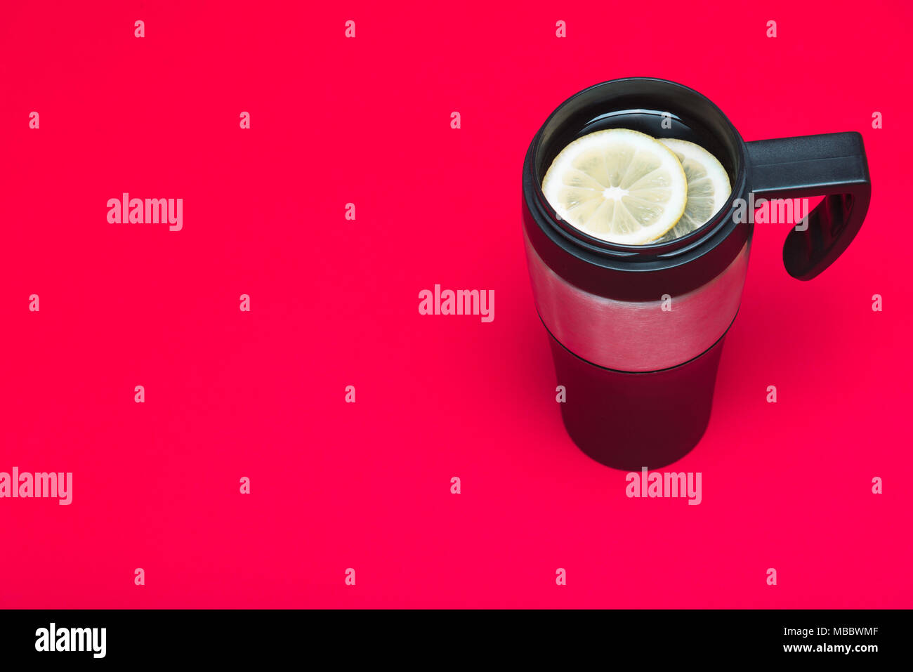 Thermo mug with tea Stock Photo - Alamy