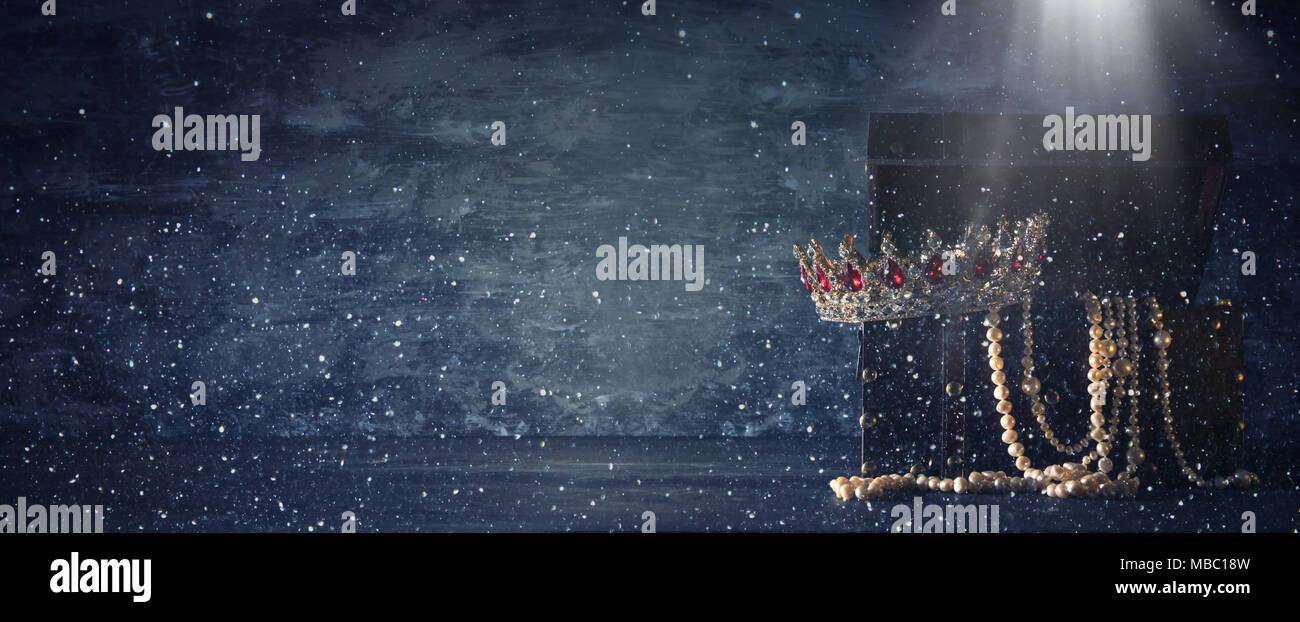 Image of mysterious opened old wooden treasure chest with light and ...