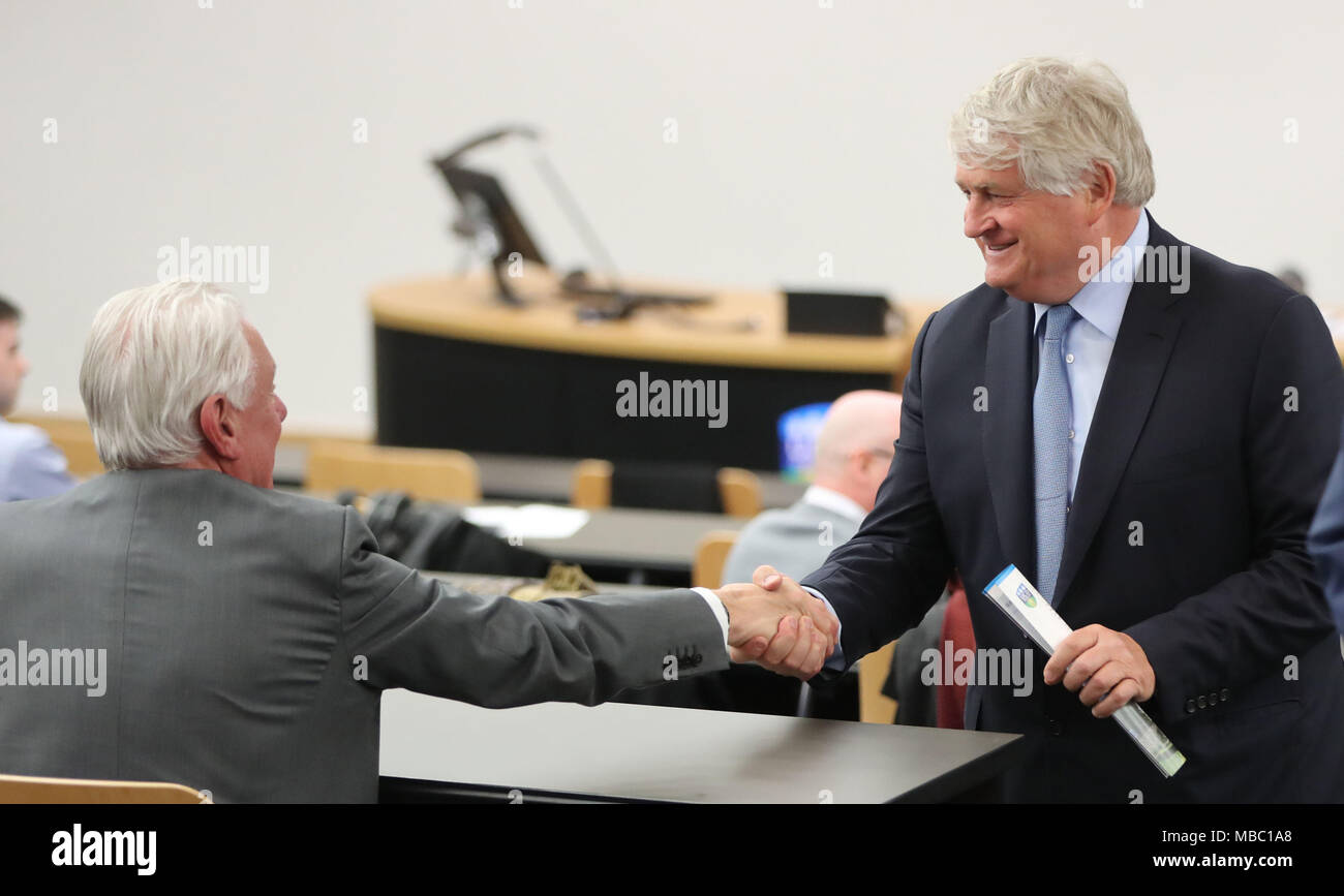 Irish businessman Denis O'Brien greets people as he arrives to hear ...