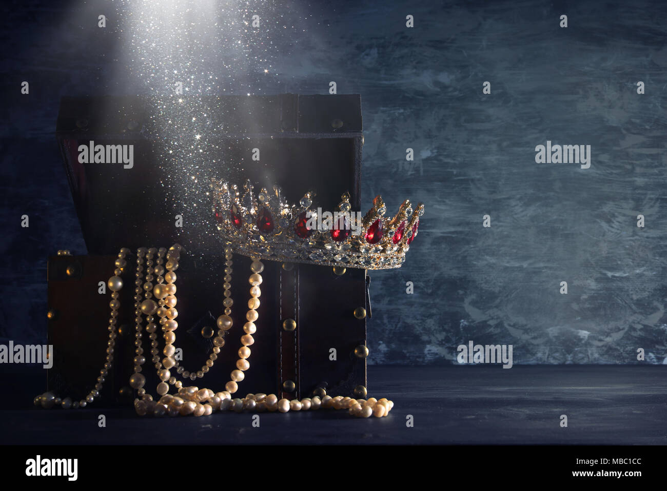 Image of mysterious opened old wooden treasure chest with light and ...