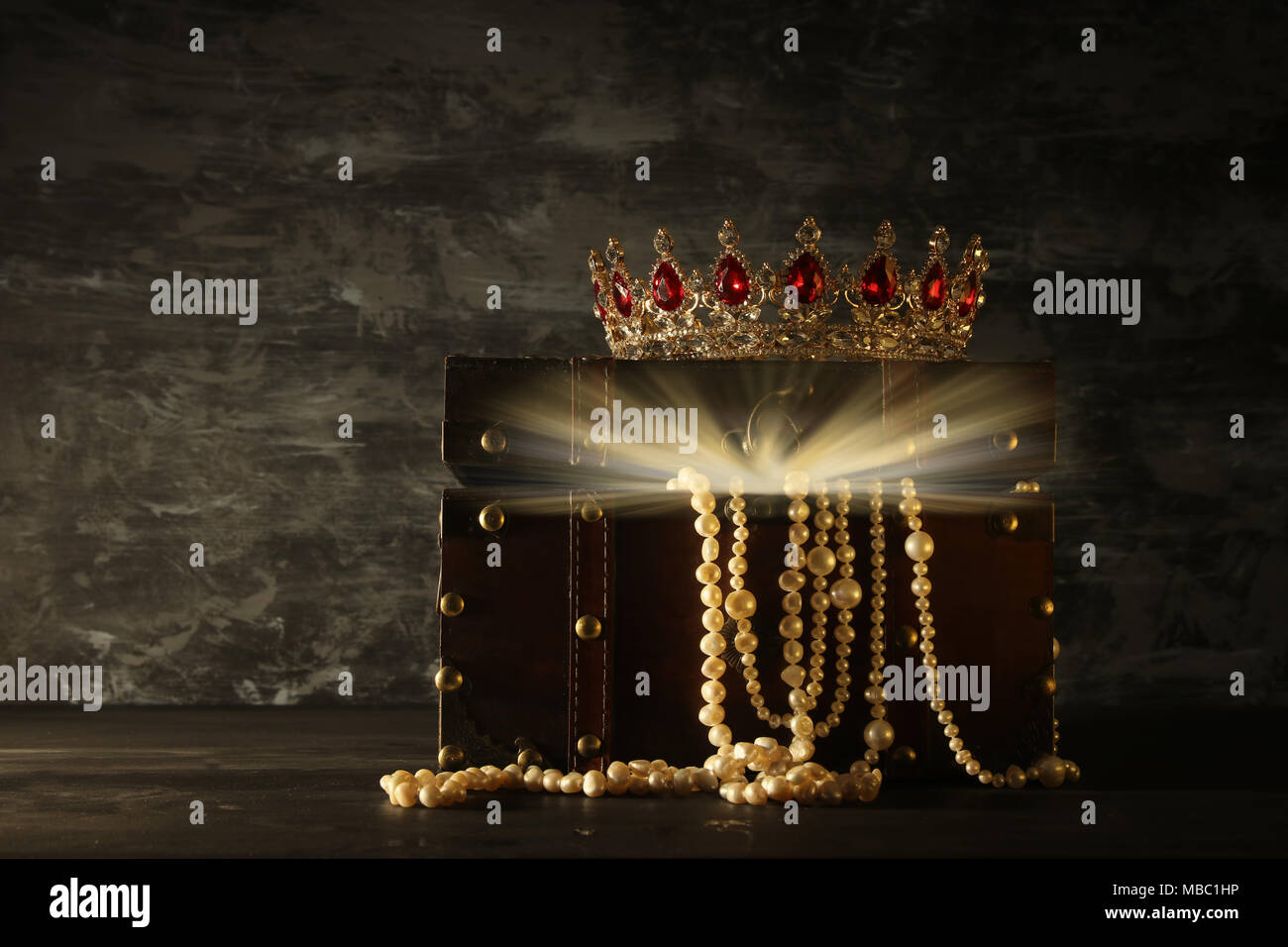 Image of mysterious opened old wooden treasure chest with light and ...