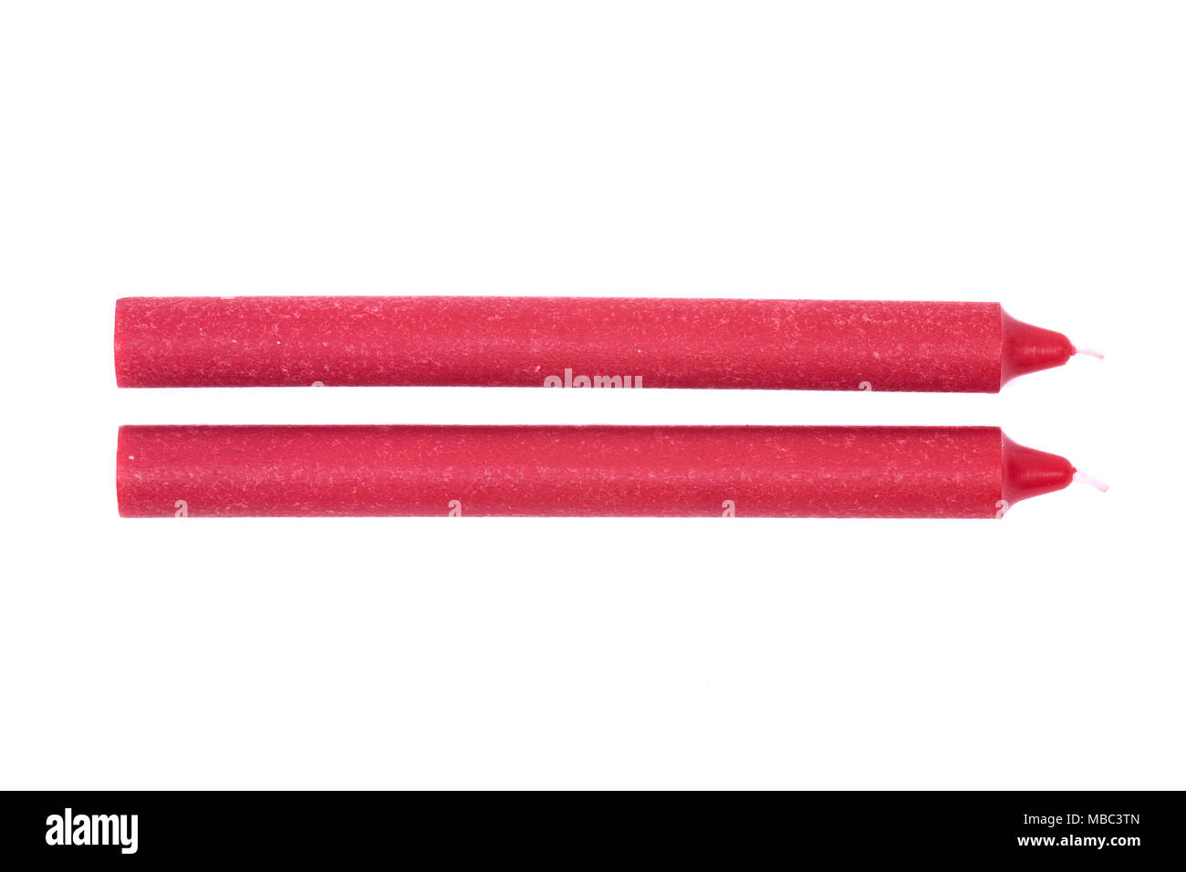 Red natural candle isolated on white background Stock Photo - Alamy