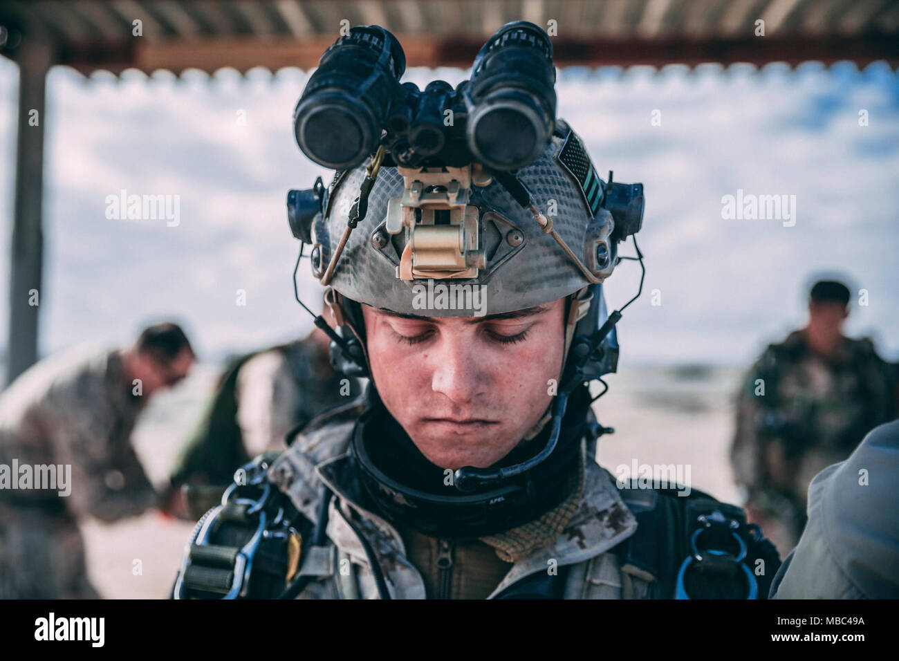 A Marine with 3rd Reconnaissance Battalion, 3rd Marine Division, III ...