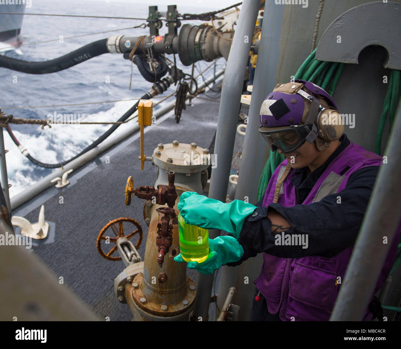 OCEAN (Feb. 13, 2018) Fireman Apprentice Jordan Tolentino, examines a ...