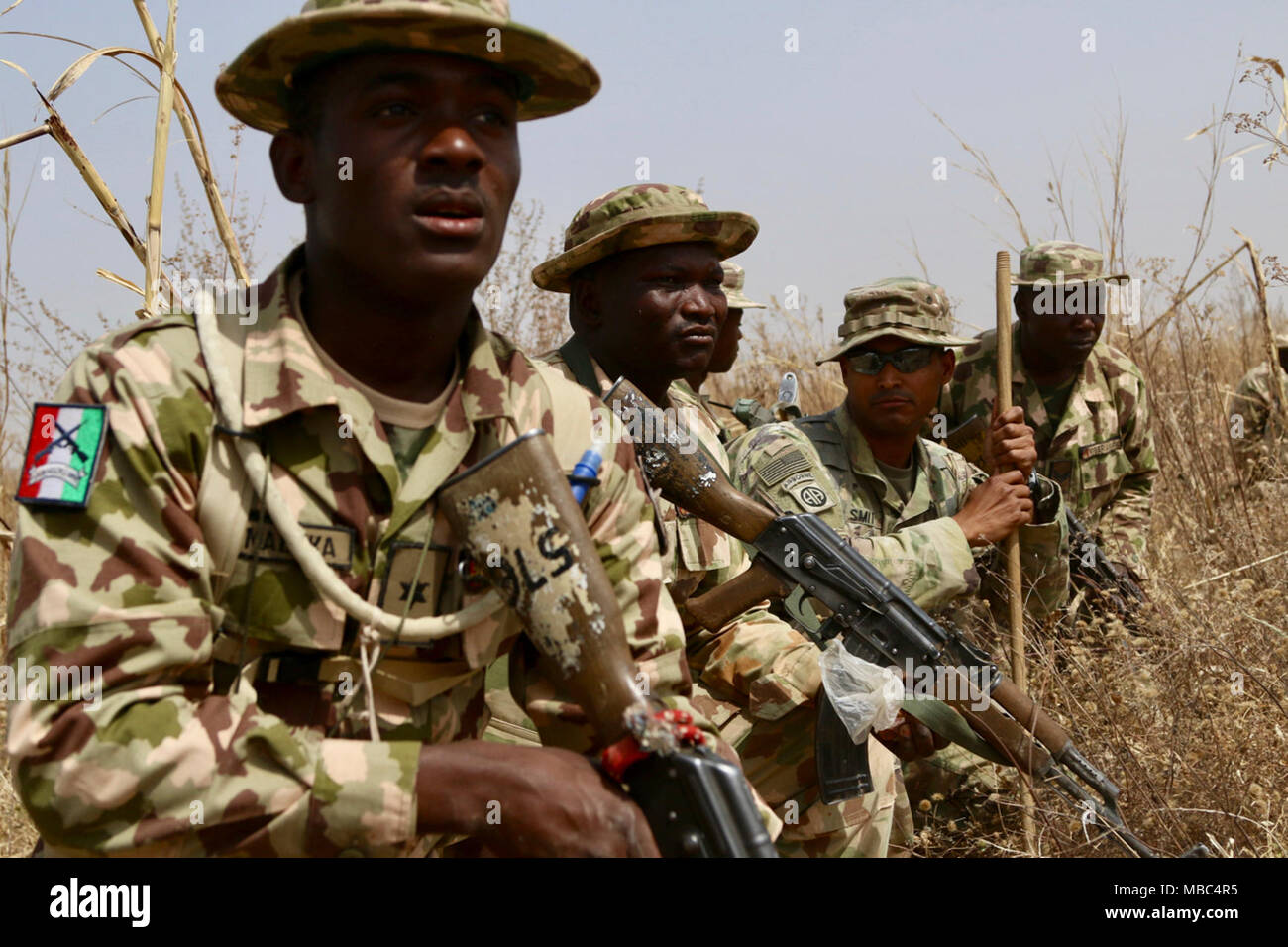 Twelve U.S. Army Soldiers share tactics and training with a little over ...