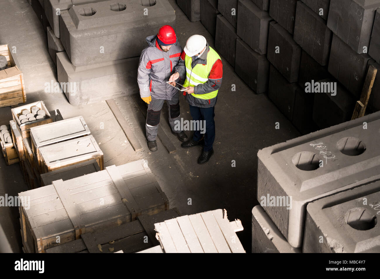 Workers in Factory Storage Stock Photo - Alamy