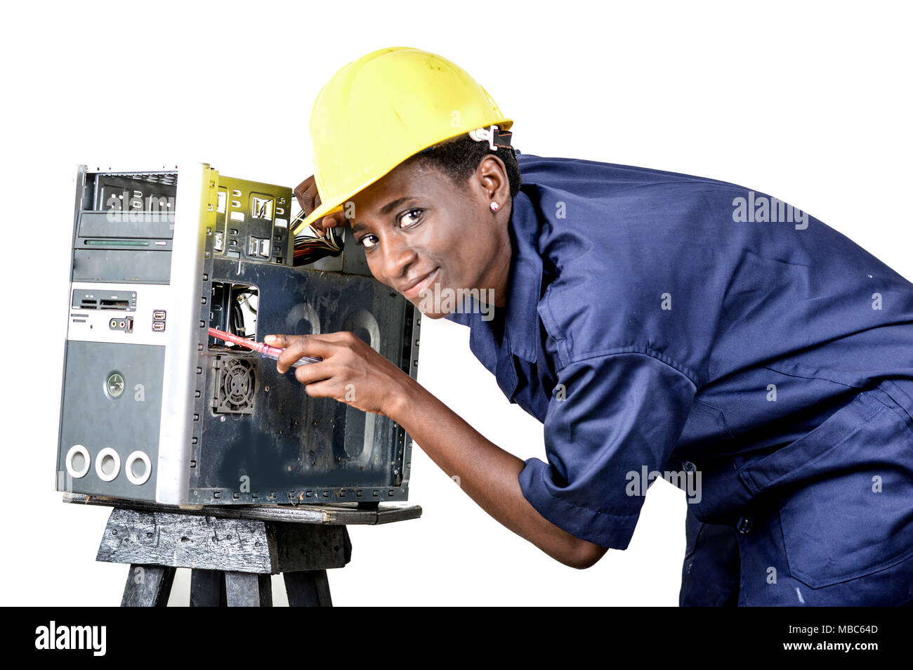 Computer maintenance technician tests the electrical circuits of the ...