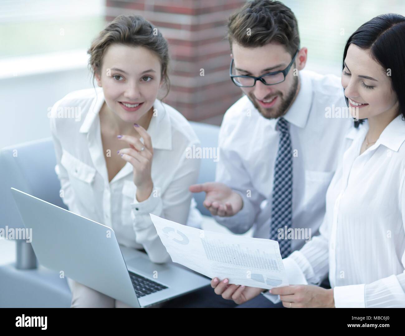 business team working with financial charts in the office Stock Photo ...
