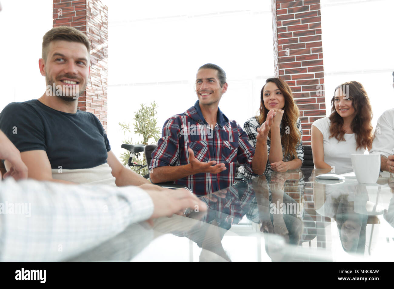 bottom view.creative team talking Stock Photo - Alamy