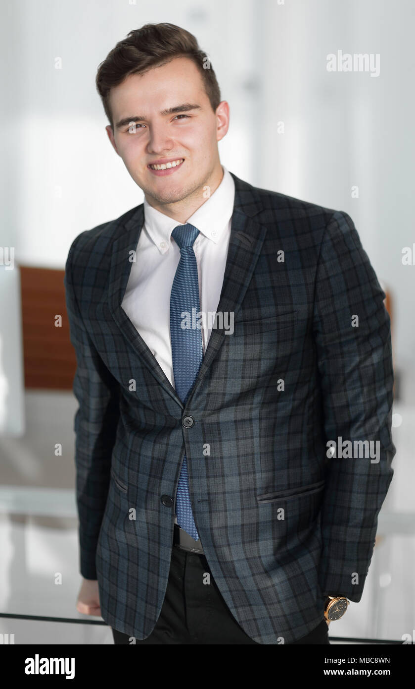 portrait of a young employee in the office Stock Photo - Alamy