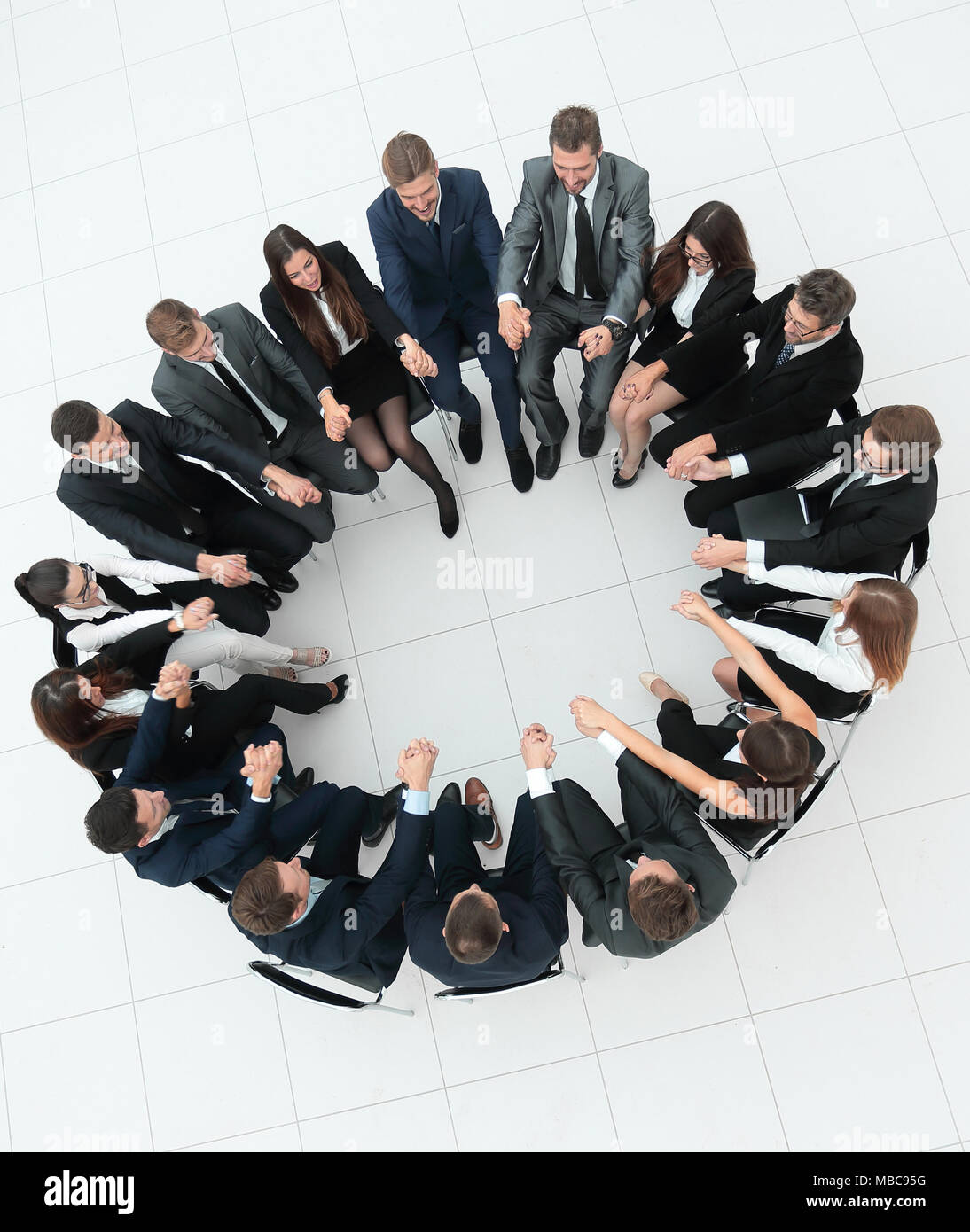 concept of team building.large business team sitting in a circle Stock ...
