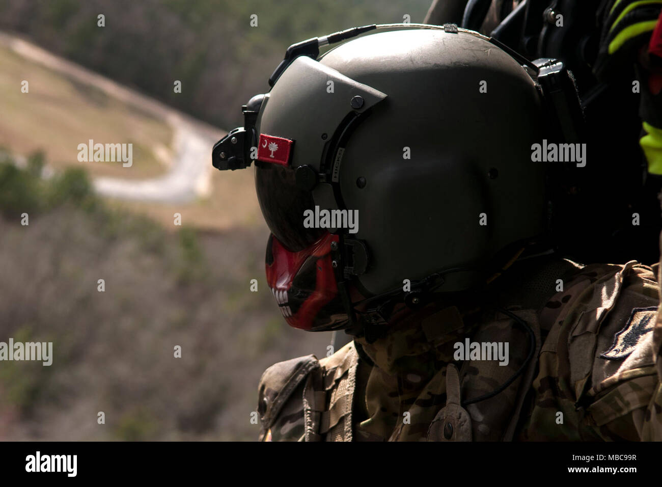 U.S. Army Sgt. Nicholas Hicks, a UH-60 Black Hawk crew chief with the ...