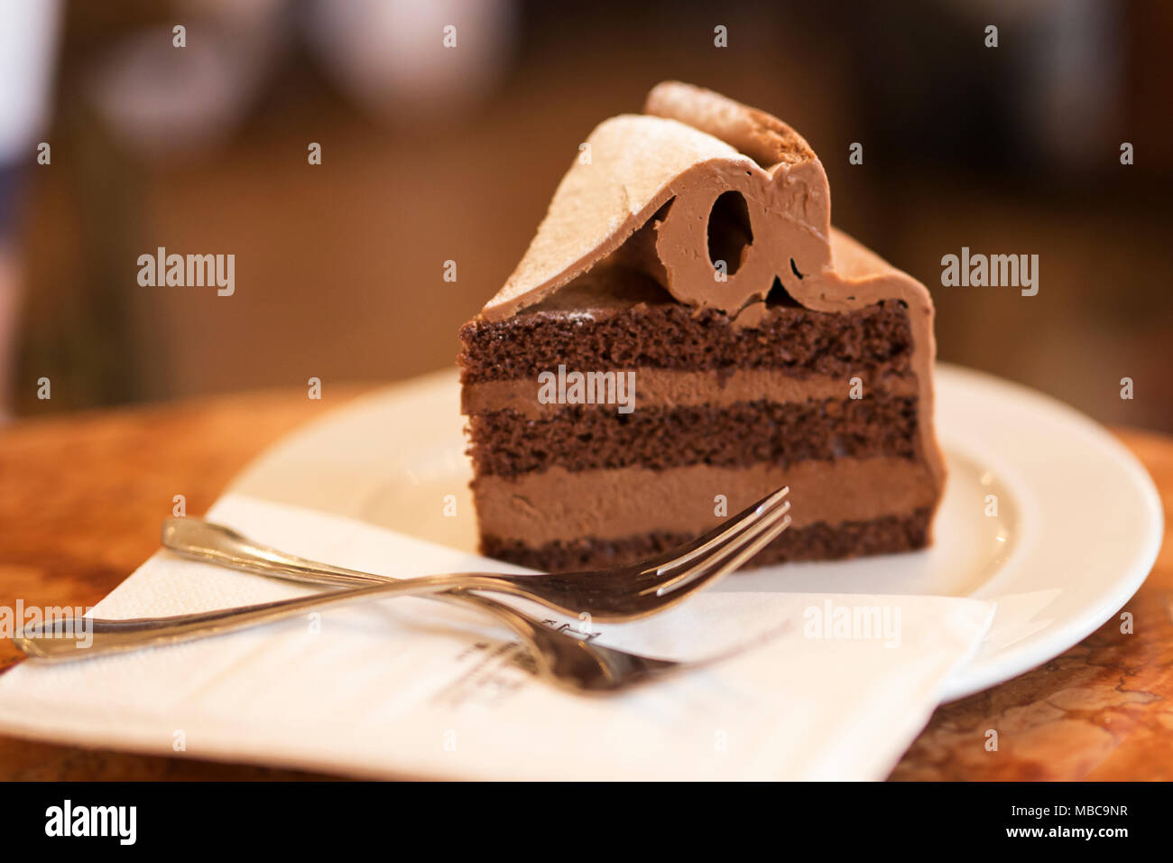 The famous Cafe Demel in Vienna, Austria. A slice of Annatorte ...