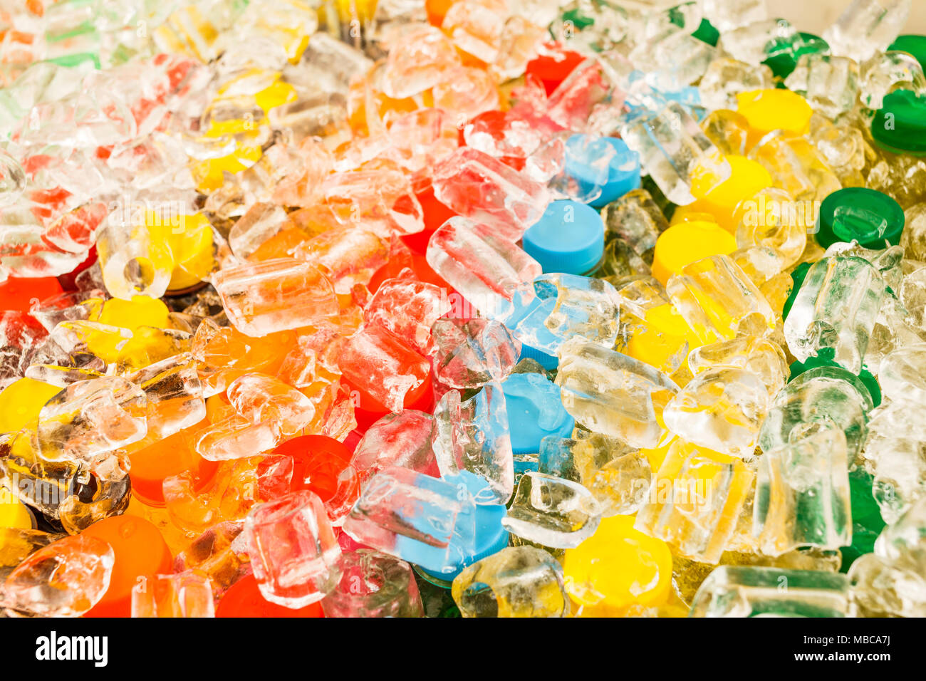 Many colorful of bottles in the ice Stock Photo - Alamy