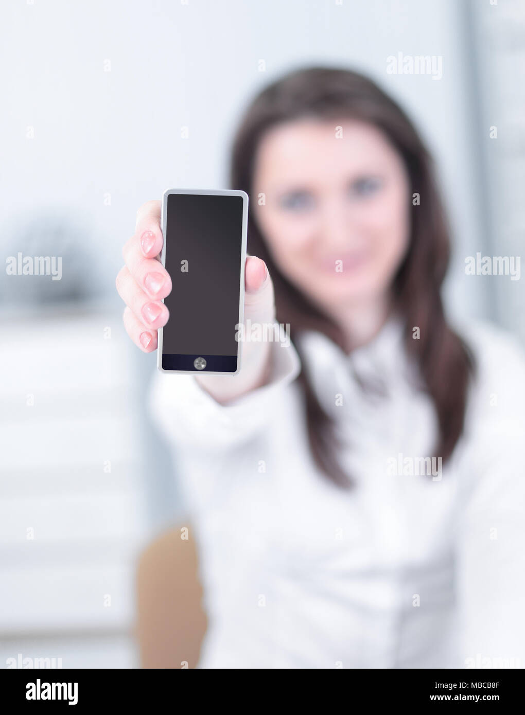 closeup. business woman showing a blank business card Stock Photo - Alamy
