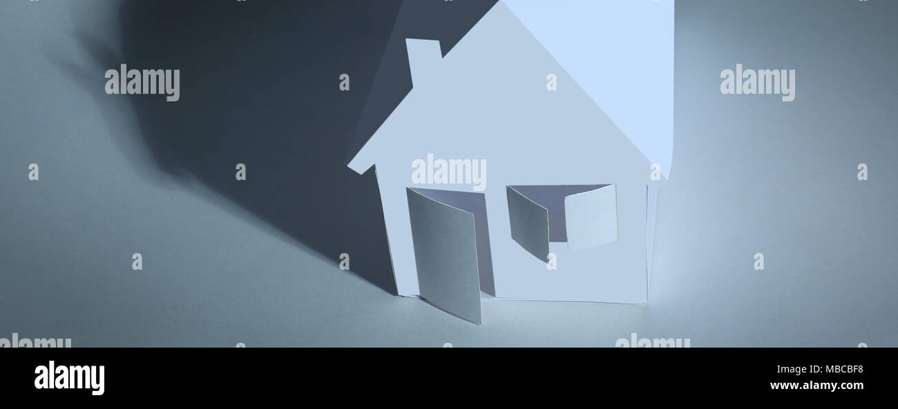 paper house paper background.the concept of a mortgage Stock Photo - Alamy