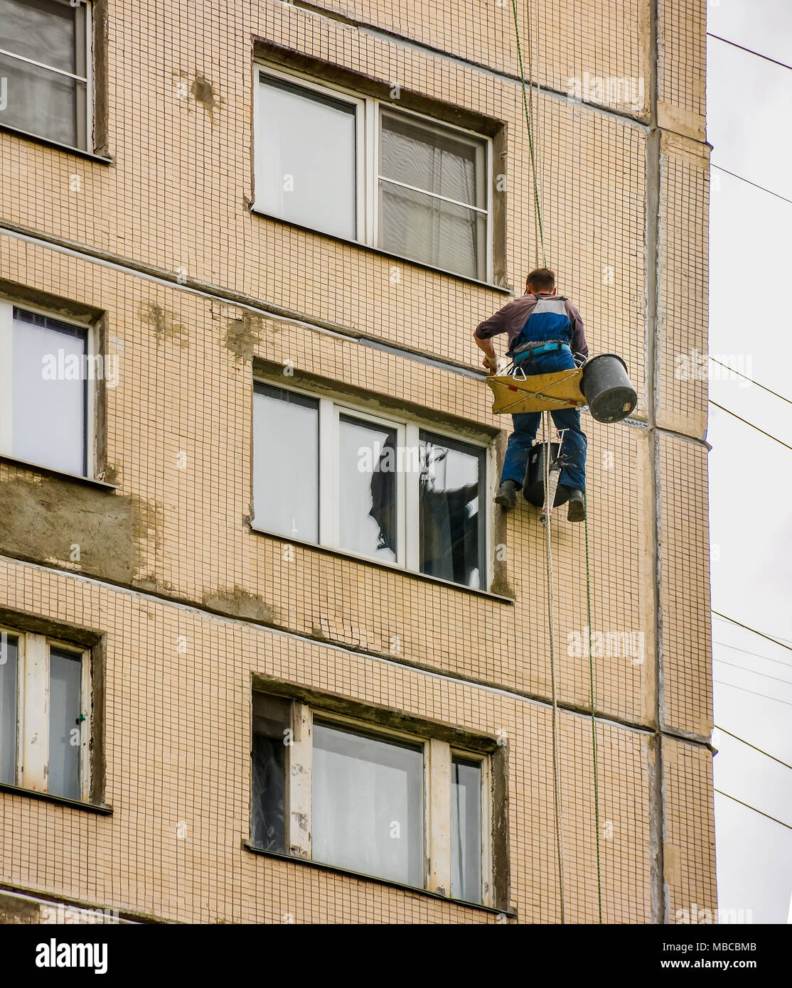 Sealing of seams between plates. The work of steeplejack repair block ...