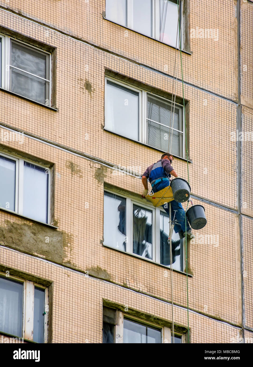 Sealing of seams between plates. The work of steeplejack repair block ...