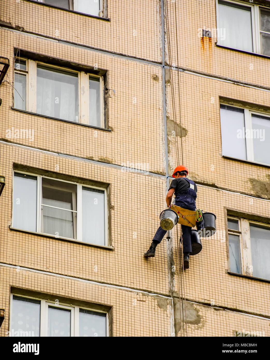 Sealing of seams between plates. The work of steeplejack repair block ...