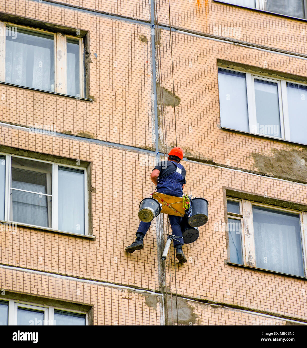 Sealing of seams between plates. The work of steeplejack repair block ...