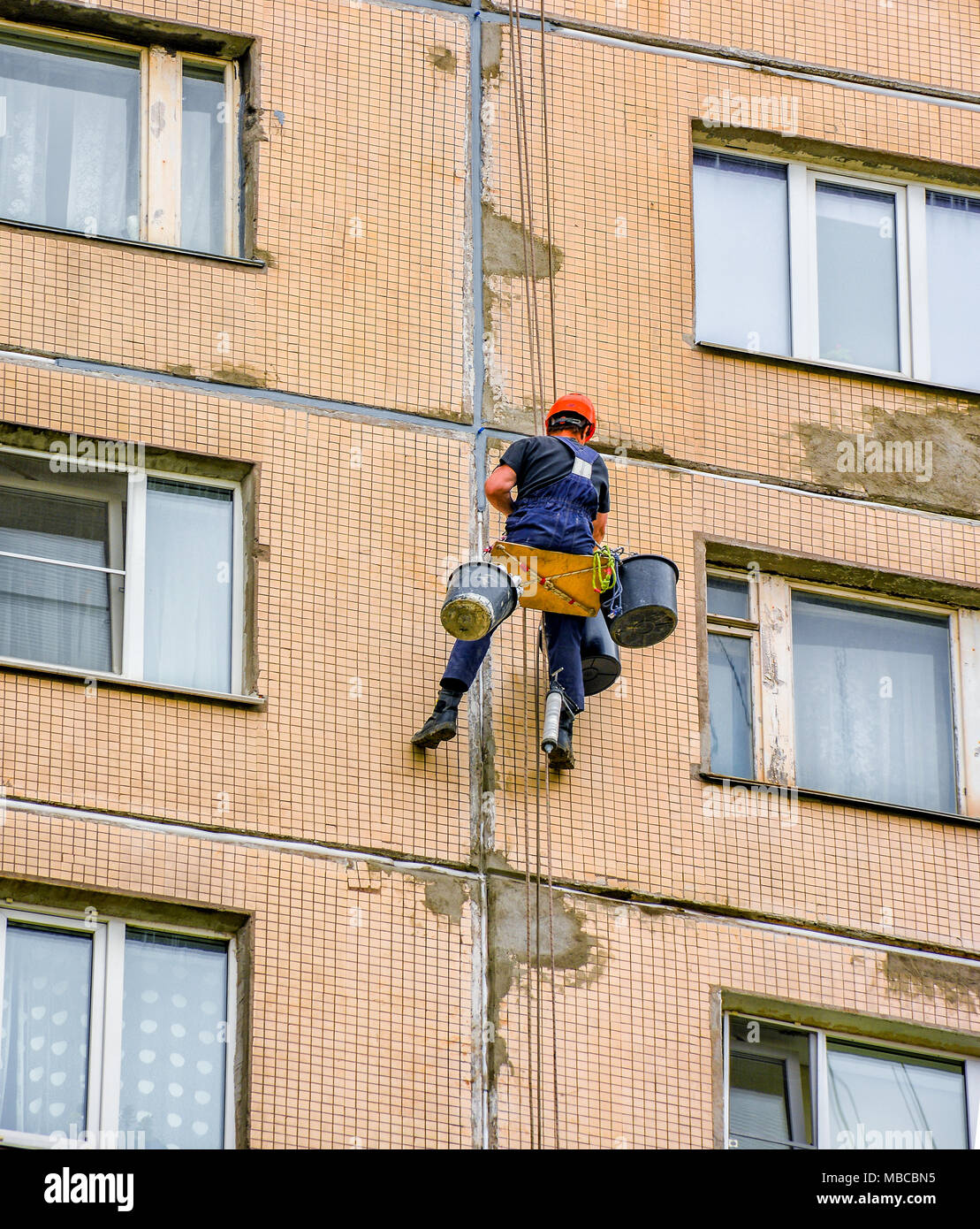 Sealing of seams between plates. The work of steeplejack repair block ...