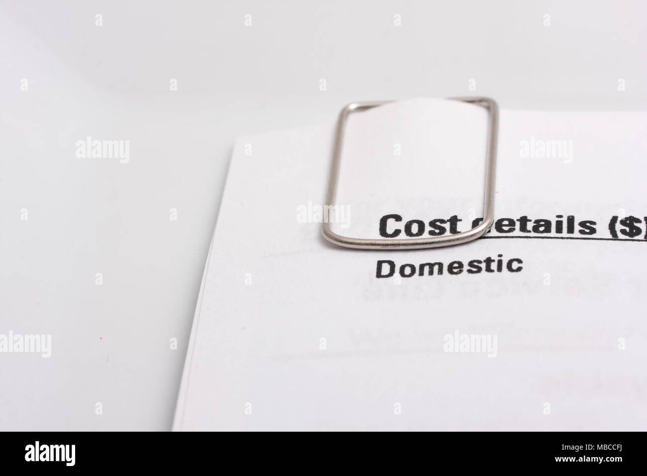 Paperclip holding papers together Stock Photo - Alamy