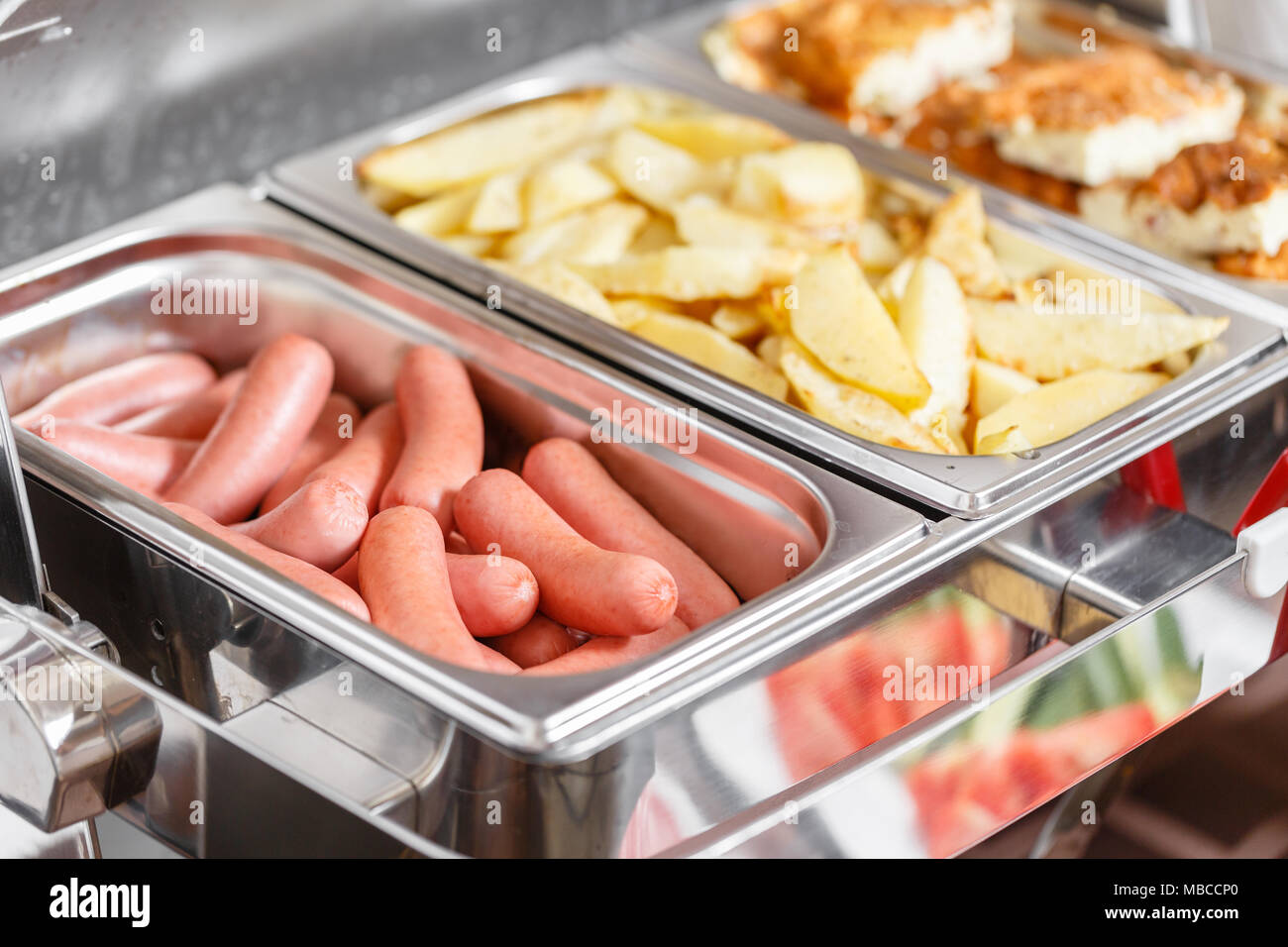 Buffet heated trays ready for service. Breakfast in hotel smorgasbord ...