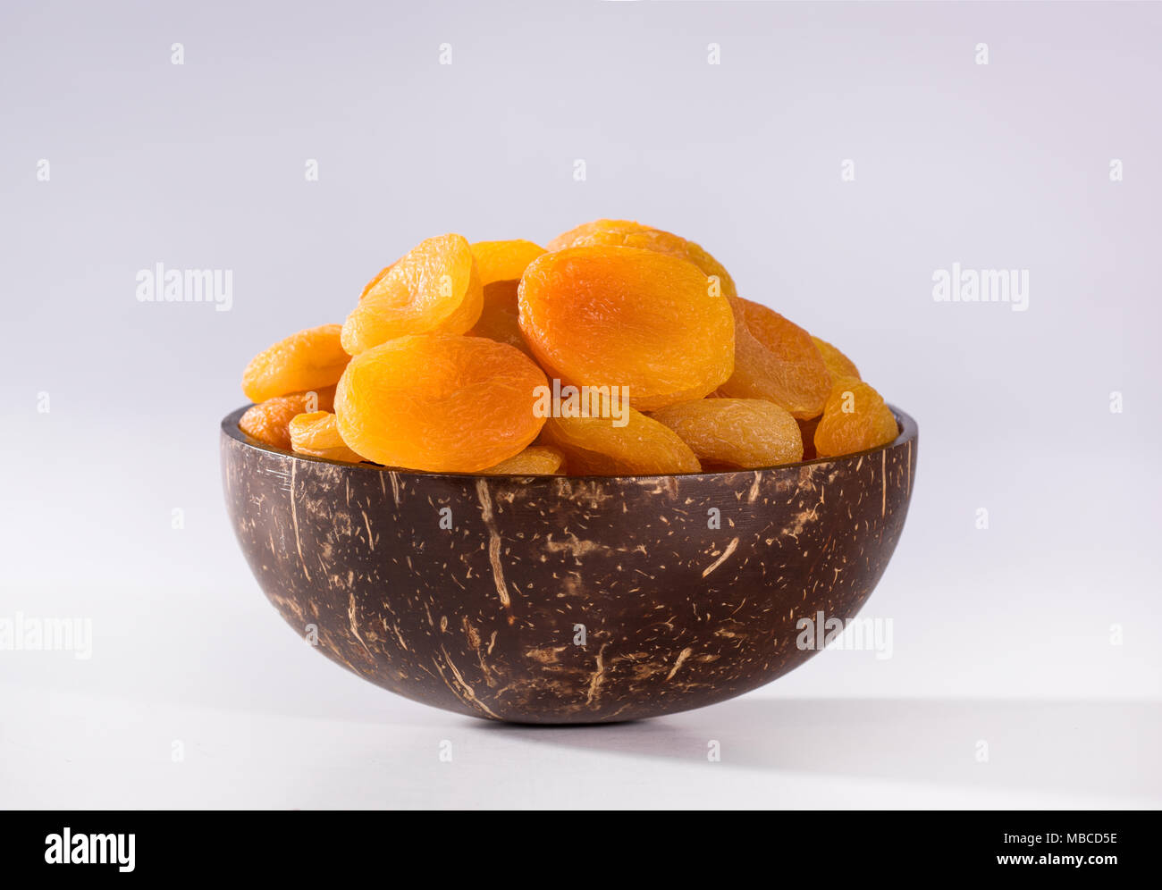 apricot in coconut shell Stock Photo - Alamy