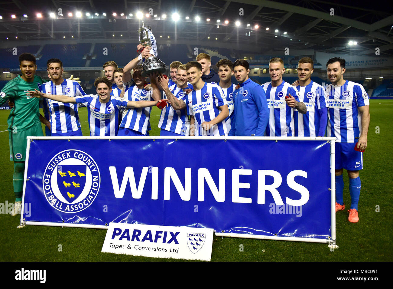 Brighton & Hove Albion Under 23s lift the trophy after winning the ...