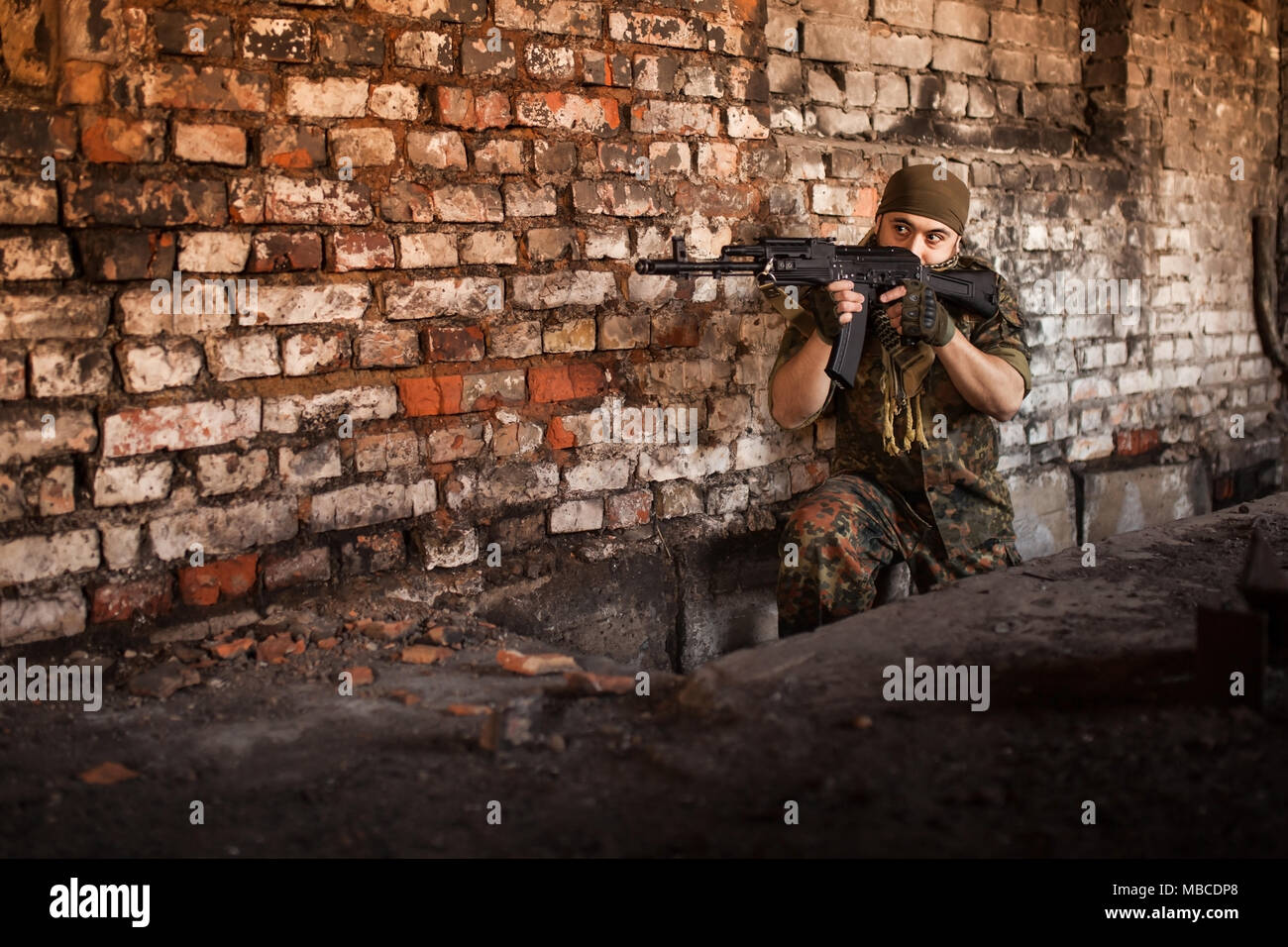 Arab soldier aiming with Kalashnikov AK-47 assault rifle Stock Photo ...